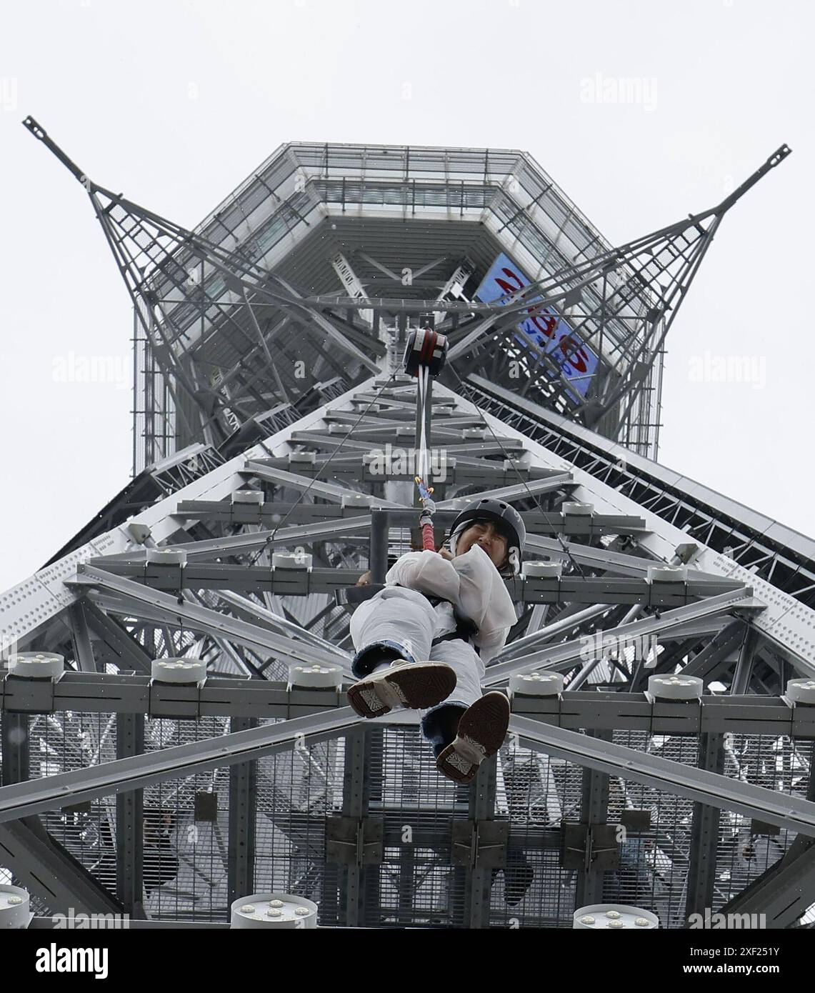 Osaka, Japan. 01st July, 2024. A "Dive and Walk" attraction begins at ...