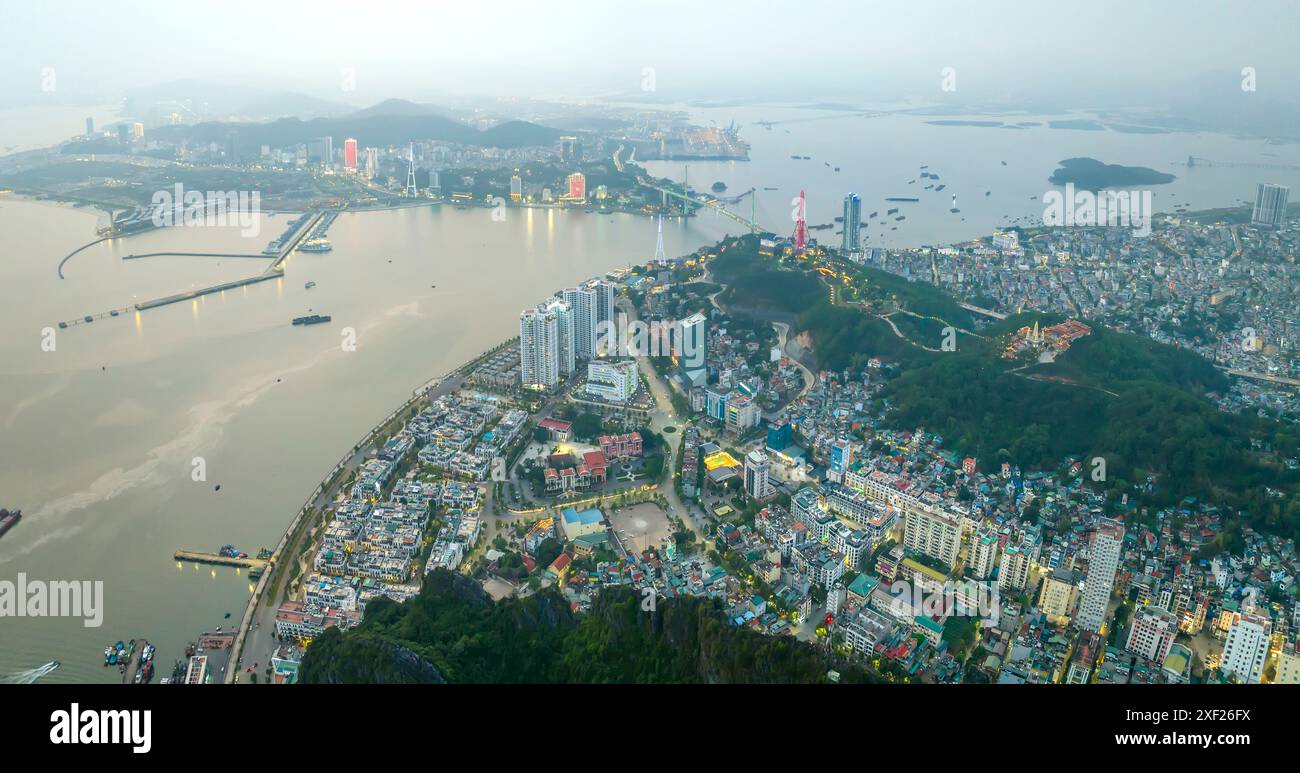 Aerial view of Ha Long cityscape at twilight period. Urban development ...