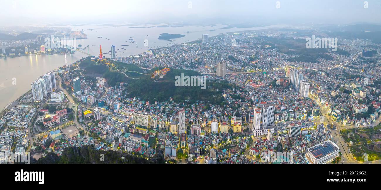 Aerial view of Ha Long cityscape at twilight period. Urban development ...
