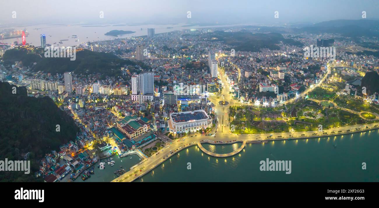 Aerial view of Ha Long cityscape at twilight period. Urban development ...