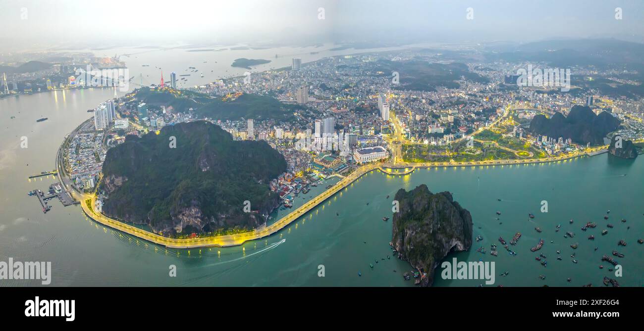 Aerial view of Ha Long cityscape at twilight period. Urban development ...