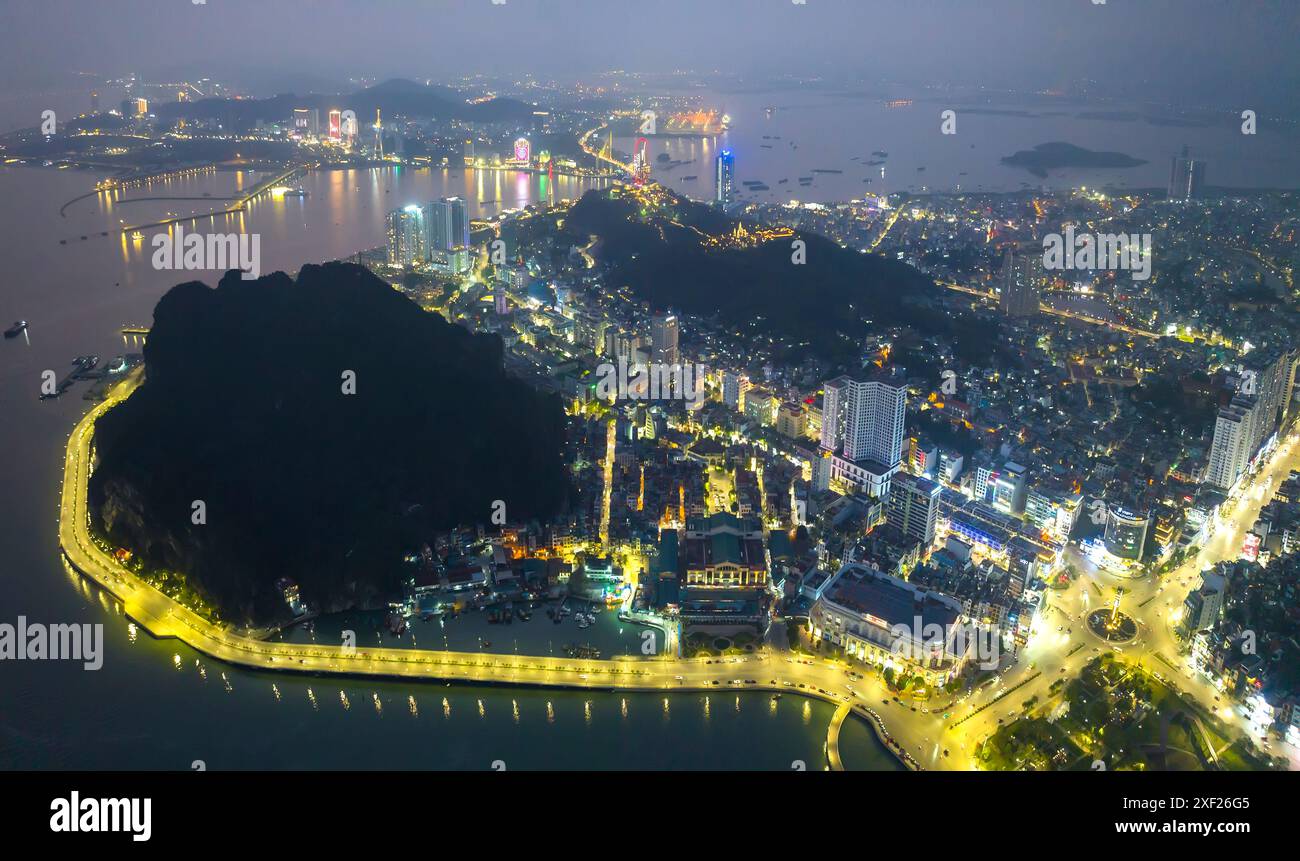 Aerial view of Ha Long cityscape at twilight period. Urban development ...