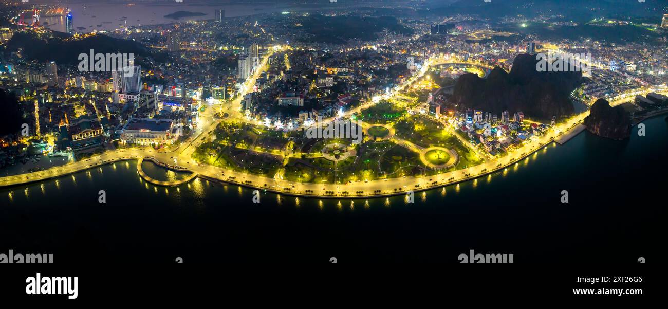 Aerial view of Ha Long cityscape at twilight period. Urban development ...