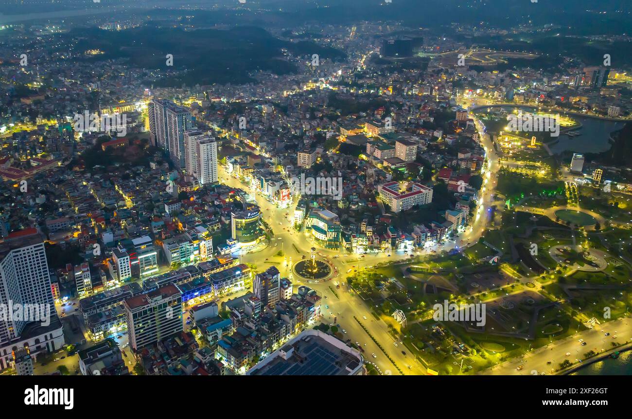 Aerial view of Ha Long cityscape at twilight period. Urban development ...