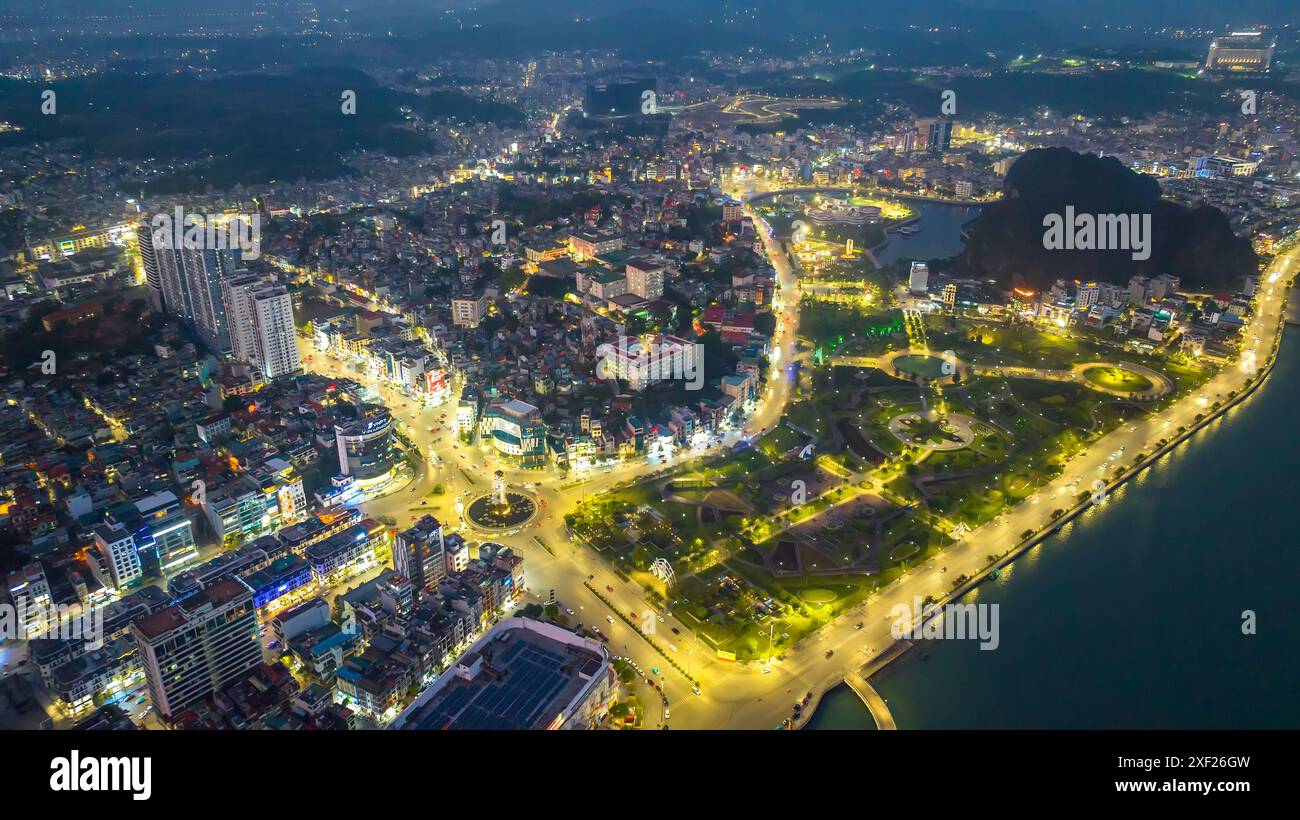 Aerial view of Ha Long cityscape at twilight period. Urban development ...