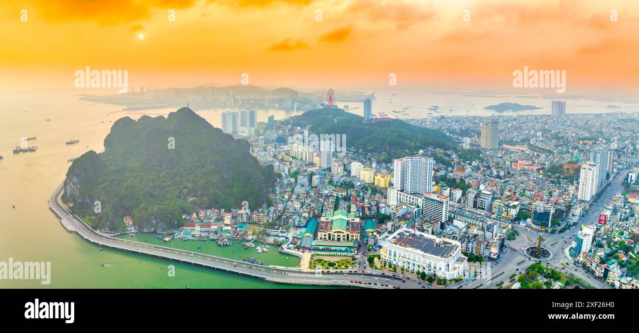 Aerial view of Ha Long cityscape at sunset sky. Urban development texture, transport ...