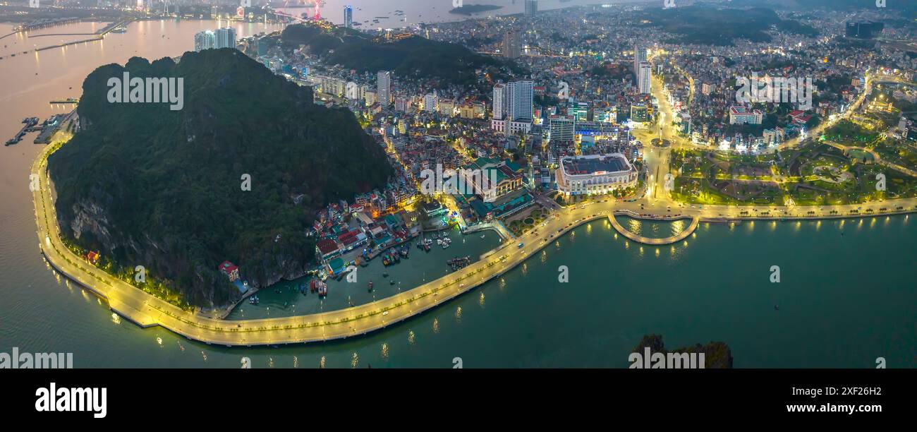 Aerial view of Ha Long cityscape at twilight period. Urban development ...
