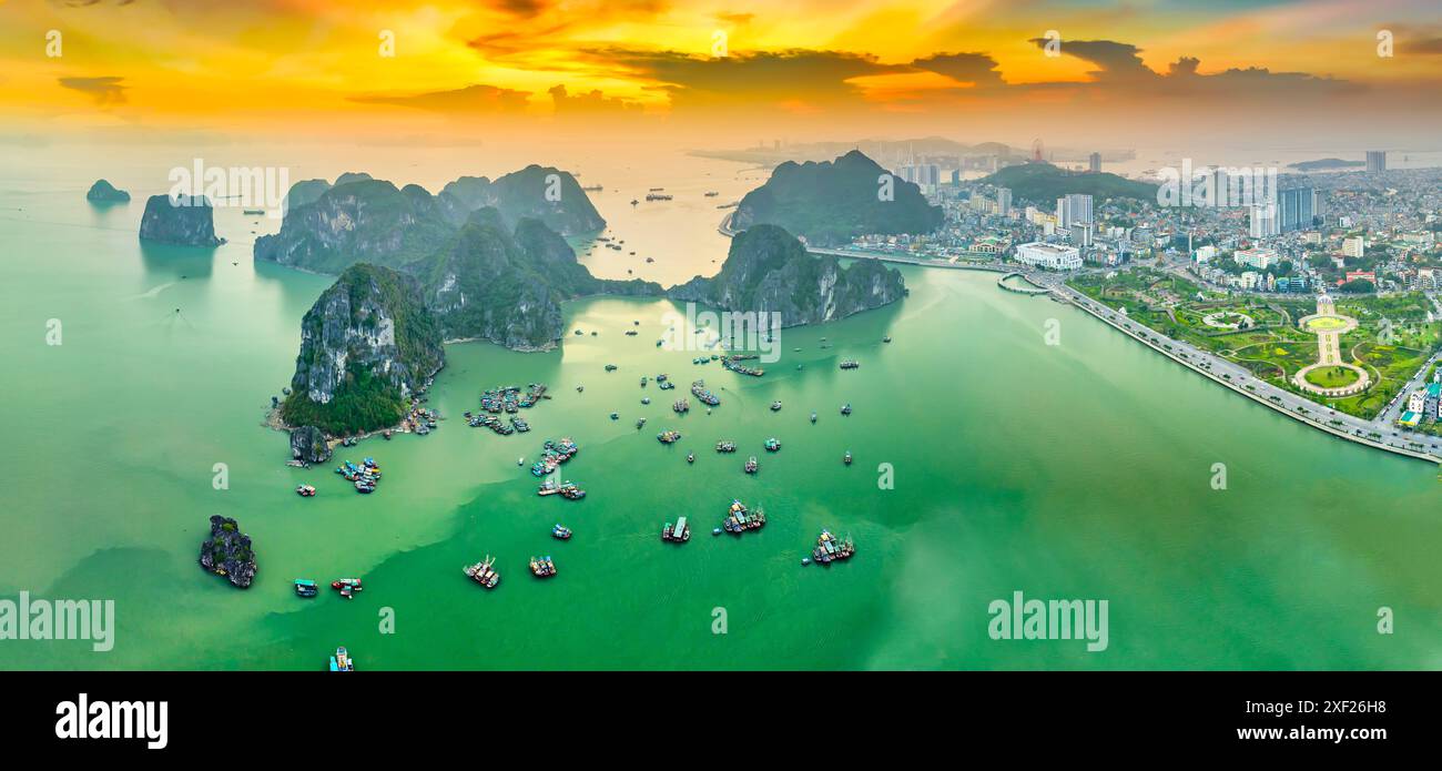 Aerial view of Ha Long cityscape at sunset sky. Urban development ...