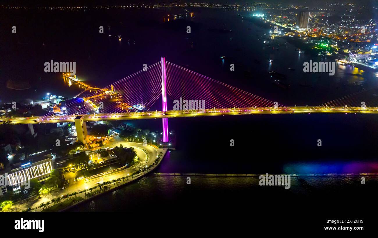 Aerial view of Bai Chay bridge night lights shimmering two peninsula ...
