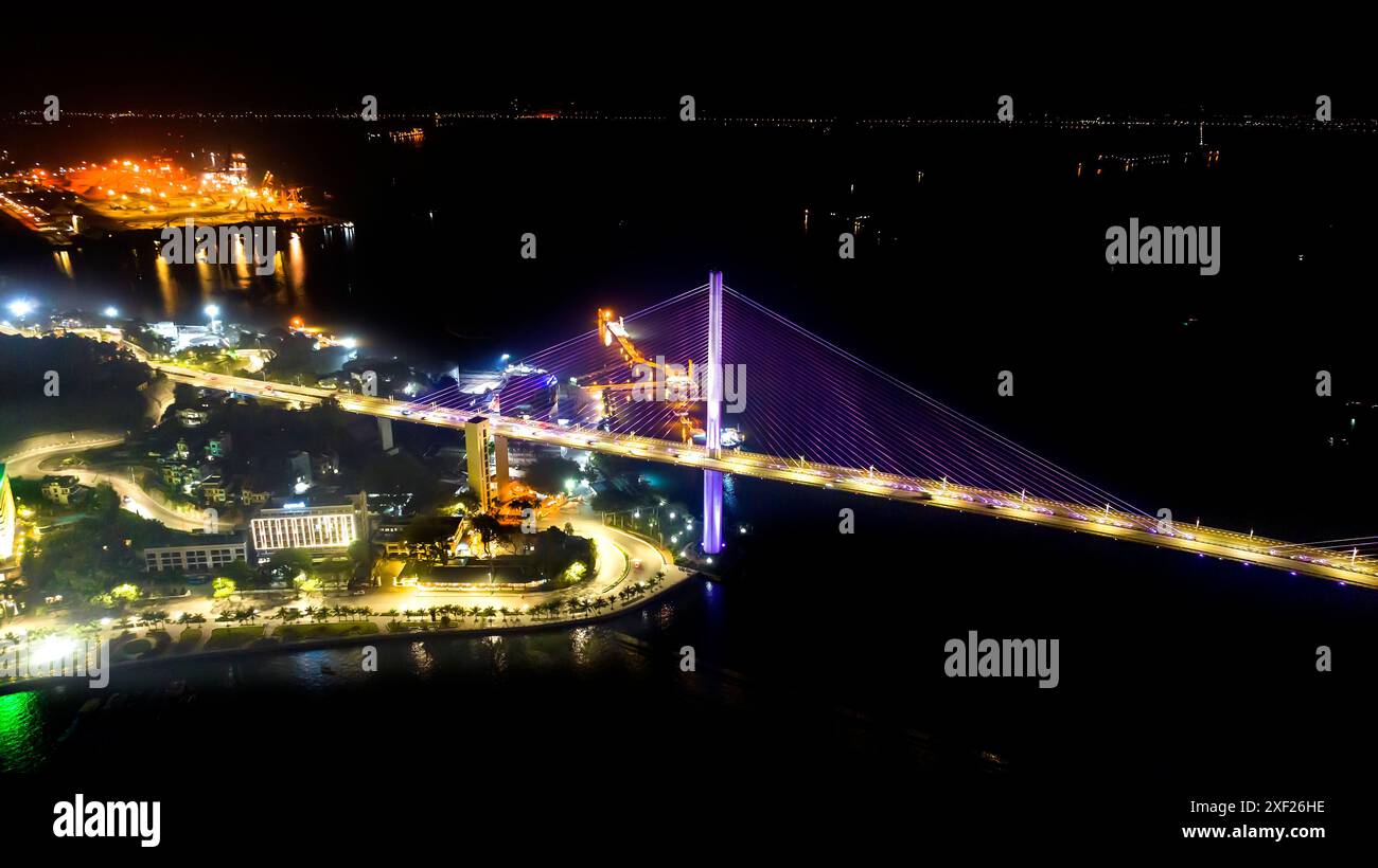 Aerial view of Bai Chay bridge night lights shimmering two peninsula ...