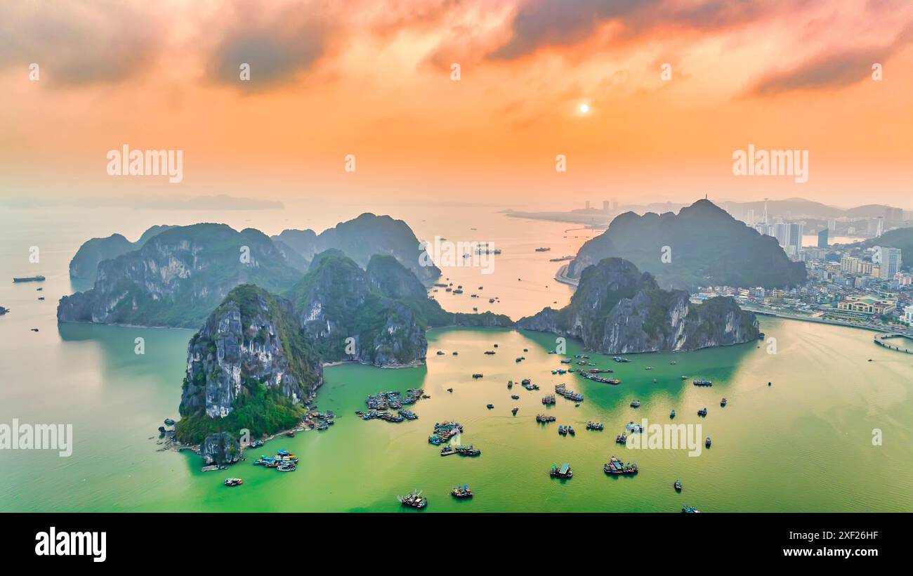 Aerial view of Ha Long cityscape at sunset sky. Urban development ...
