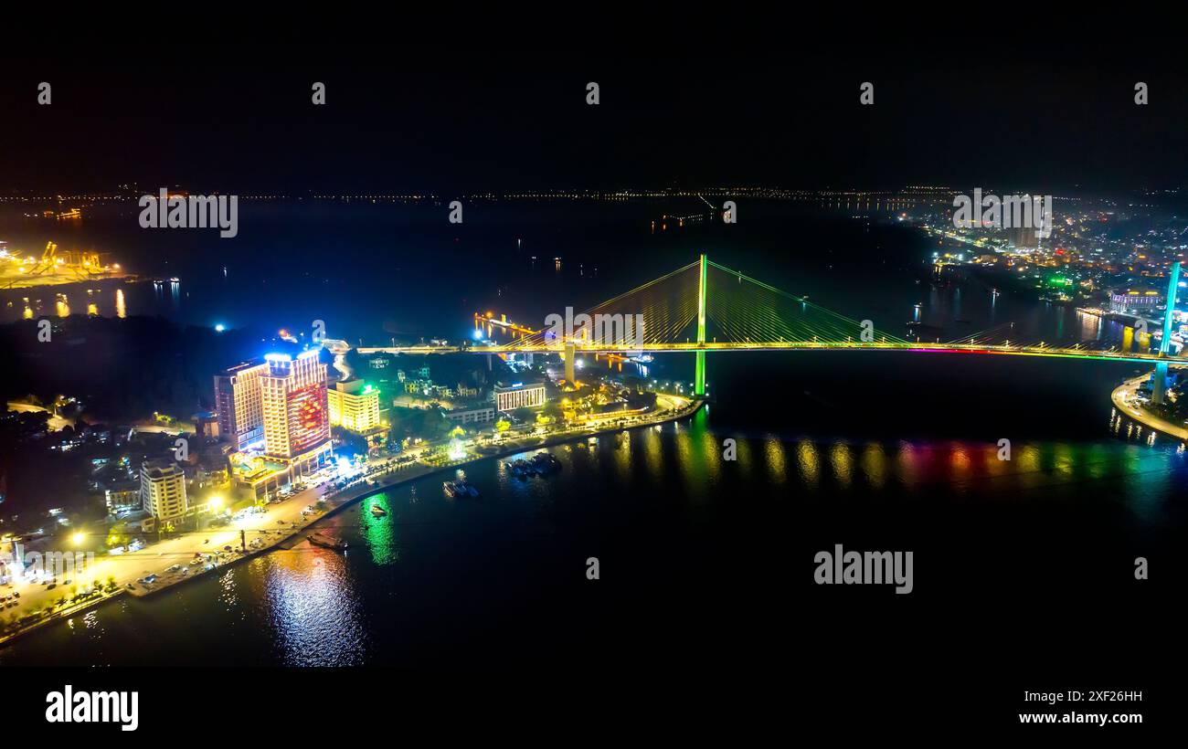 Aerial view of Bai Chay bridge night lights shimmering two peninsula ...