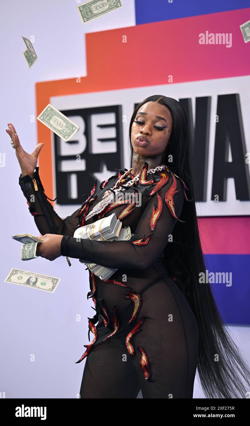 Los Angeles, United States. 30th June, 2024. Sexyy Red throws money ...