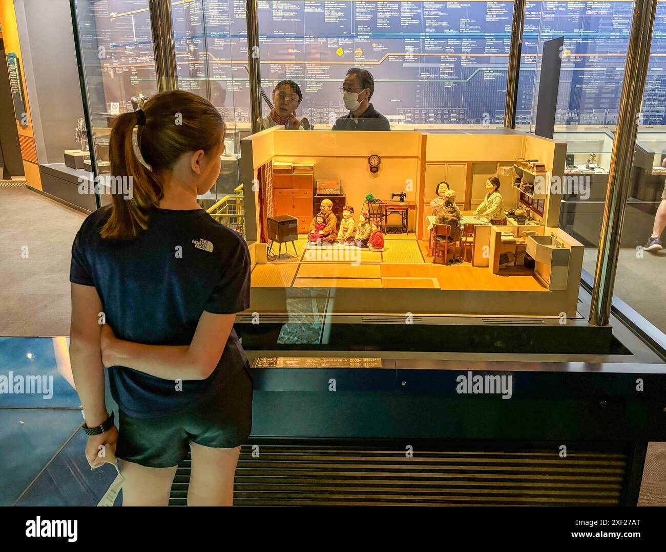 A visitor looking models of Osaka city during their visit to the Osaka ...