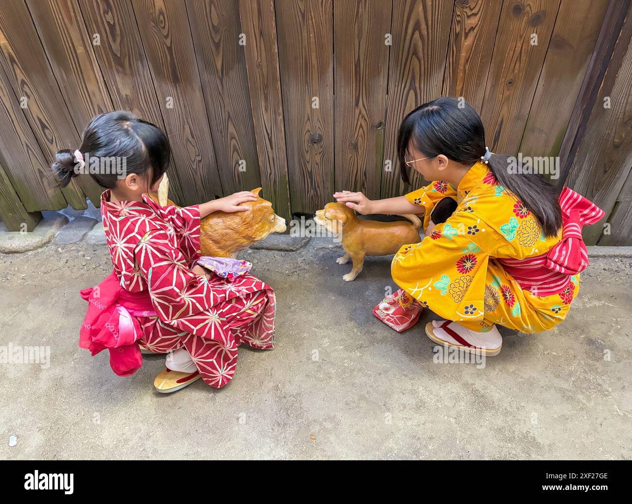 Kids dressed in traditional Japanese kimono during visit to the Osaka ...