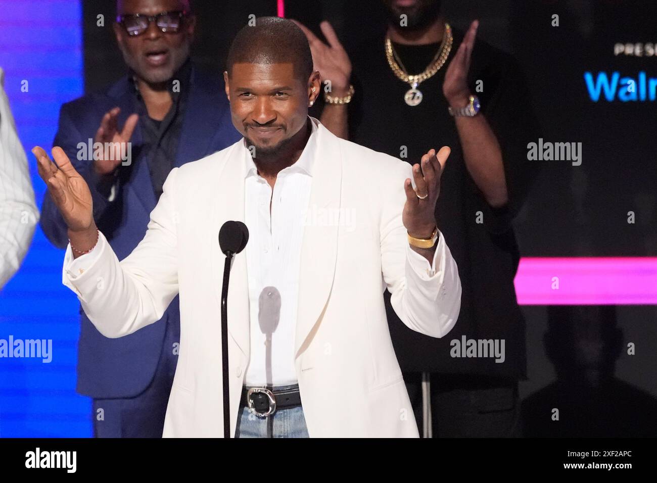 Usher accepts the Lifetime Achievement award during the BET Awards on ...