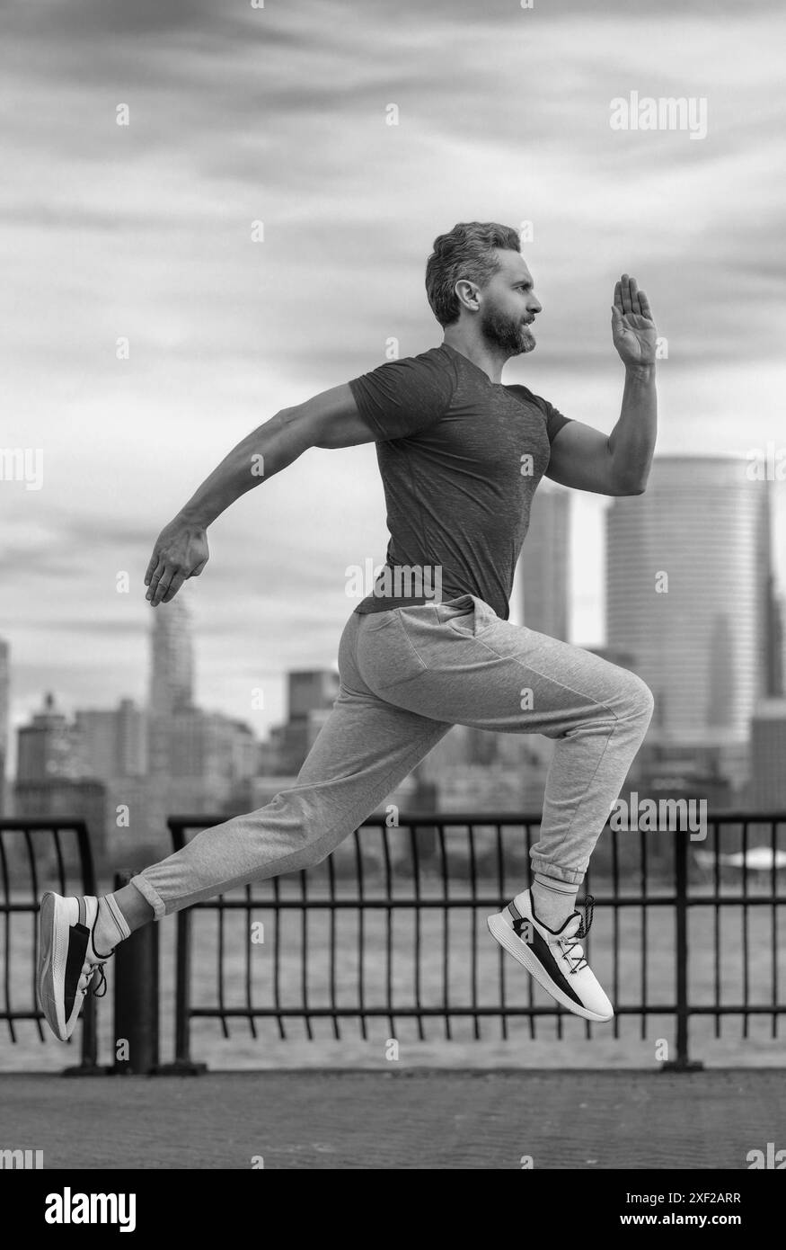 Guy run city Black and White Stock Photos & Images - Alamy