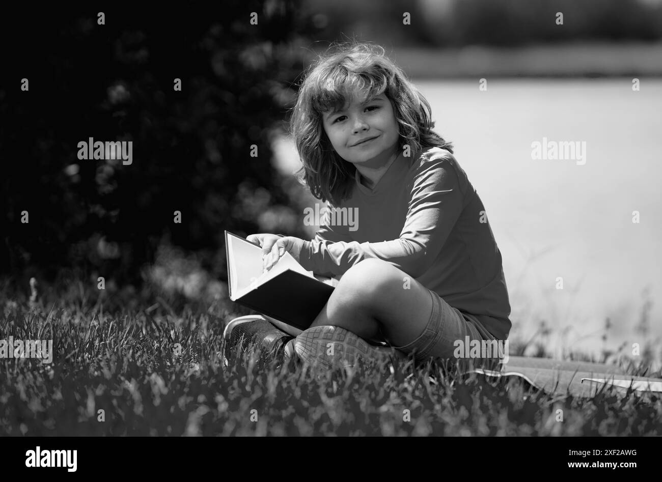 Kid read a book. Early education for kids. Summer vacation with reading ...