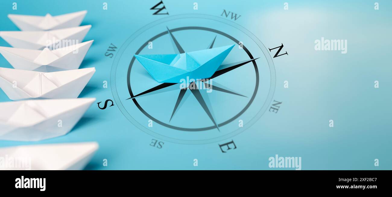 Blue Paper Boat Leading A Fleet Of Small White Boats With Compass Icon ...