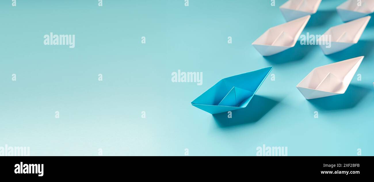 Paper boat leads the fleet with new ones joining the team. Teamwork ...