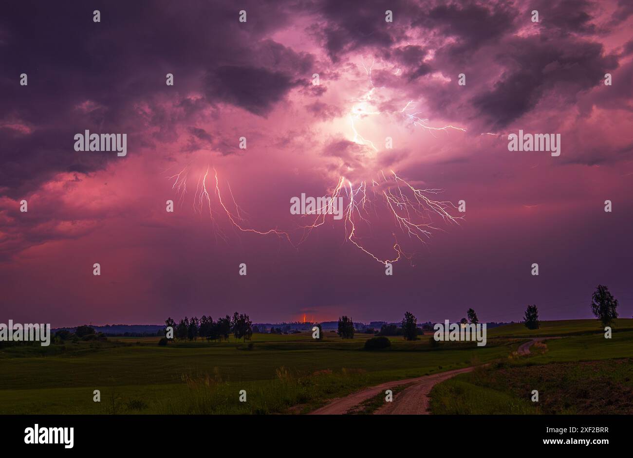 Dazzling lightning display brightening the nighttime with vibrant bolts ...