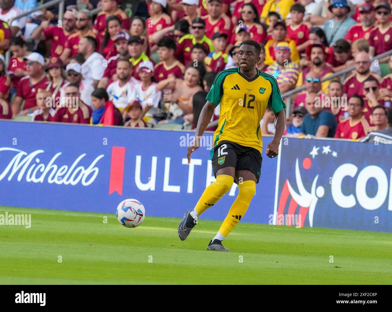 Jamaica's WESLEY NATHAN HARDING (12) looks to pass the ball during ...