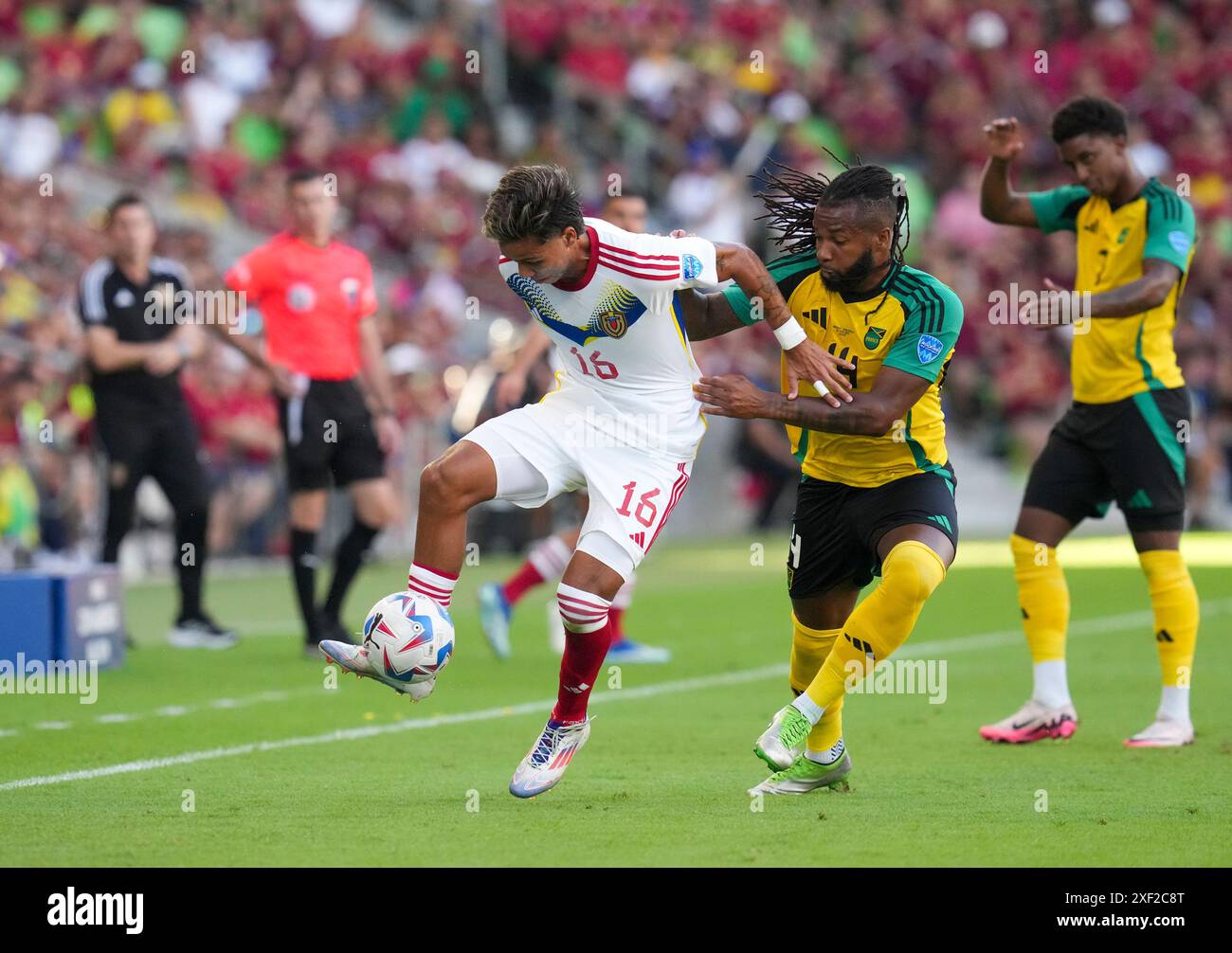 TELASCO JOSE SEGOVIA of Venezuela (16) is blocked from a shot to the ...