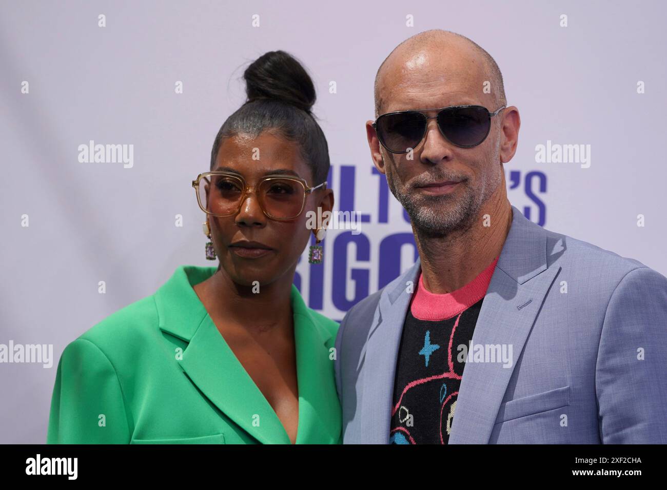From left, Cara Harvey, Jason Harvey arrive at the BET Awards on Sunday ...