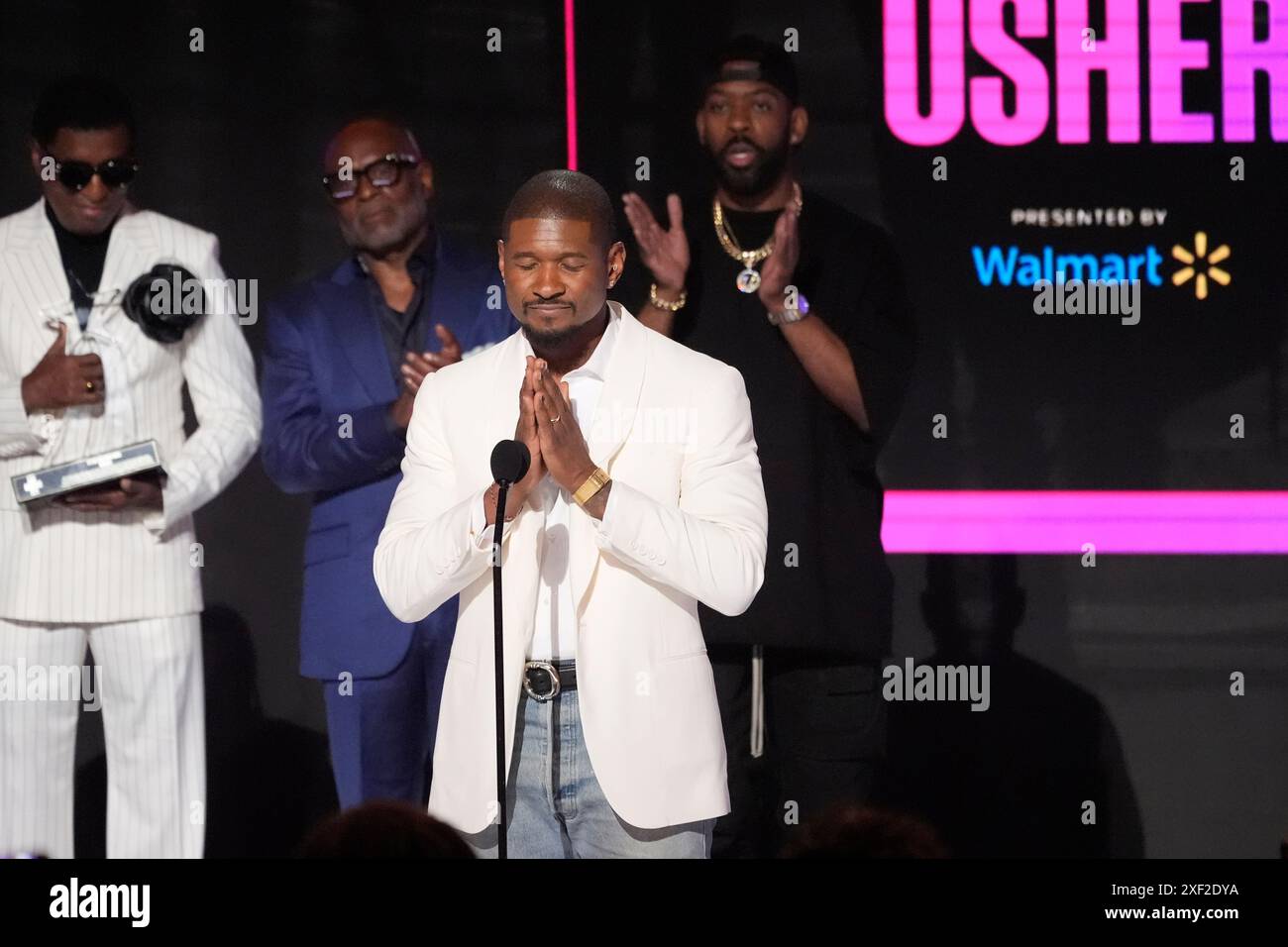 Usher accepts the Lifetime Achievement award during the BET Awards on ...
