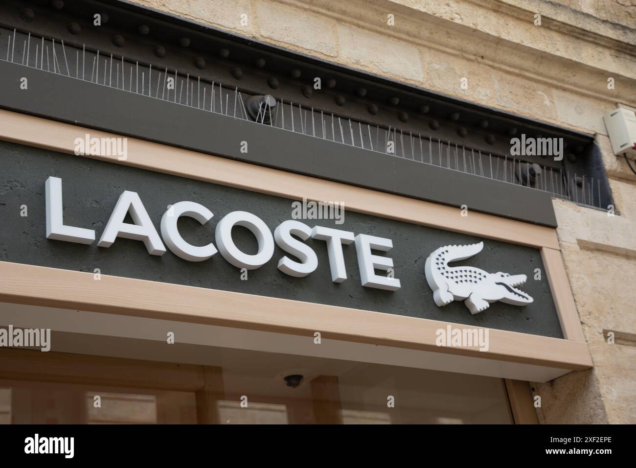 Bordeaux , France - 06 23 2024 : lacoste logo brand fashion shop and ...