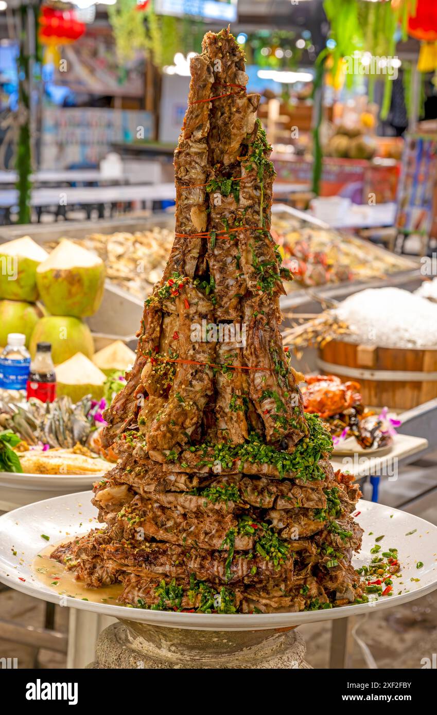Famous Thai food dish called, “Leng Saap” stacked pork topped with ...