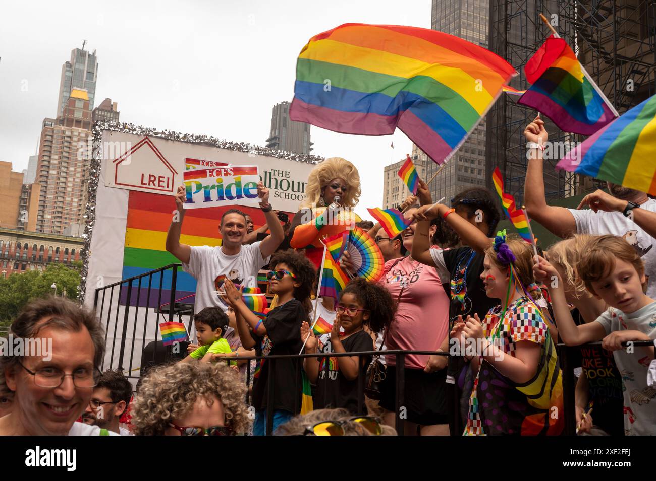 NEW YORK, NEW YORK - JUNE 30: participantes ride a float during the ...