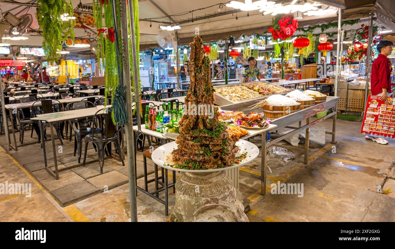 Famous Thai food dish called, “Leng Saap” stacked pork topped with ...