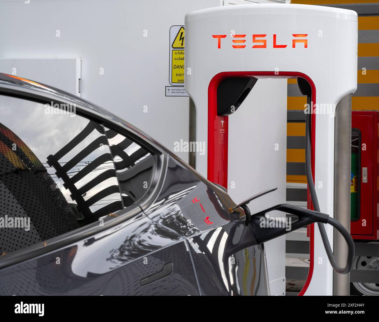 Tesla electric vehicle charging points, Thailand Stock Photo - Alamy