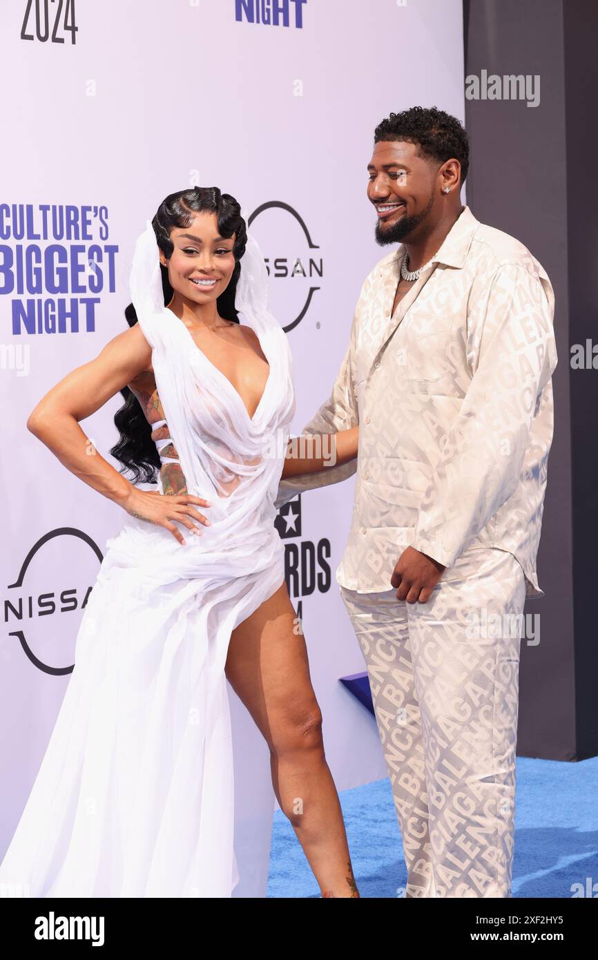 Los Angeles, USA. 30th June, 2024. Angela White and Derrick Milano attend the 2024 BET Awards at ...