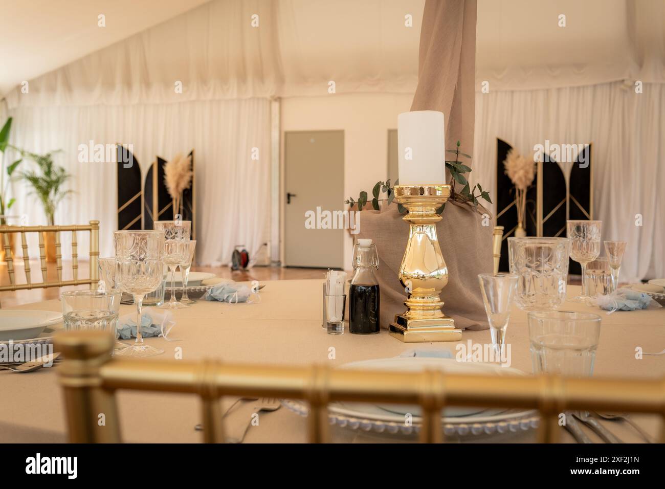 Empty Wedding Reception Hall Decorated With Gold Candelabra and White ...