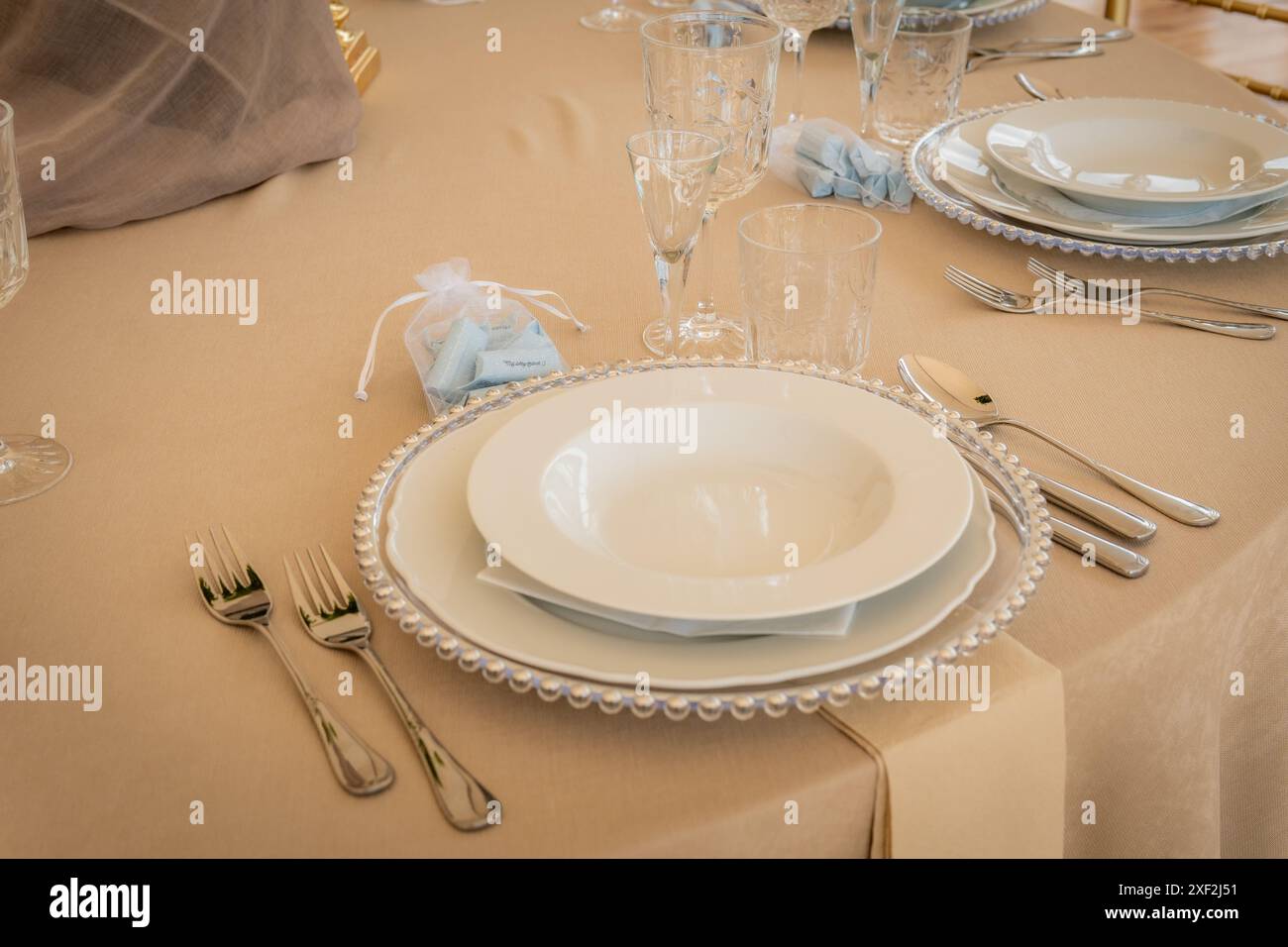 Empty Wedding Reception Hall Table Setting With Silver Charger Plates ...