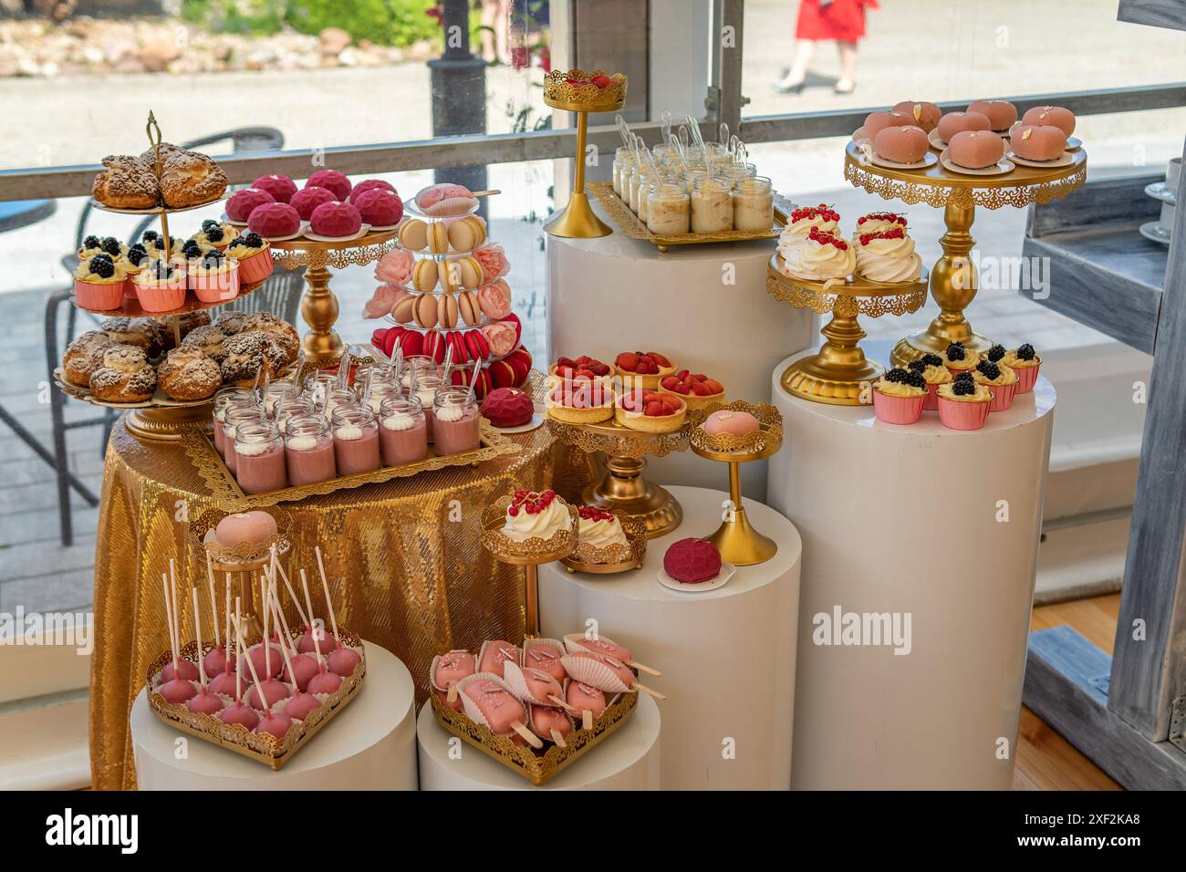 Empty Wedding Reception Dessert Table With Pink and Gold Decorations ...