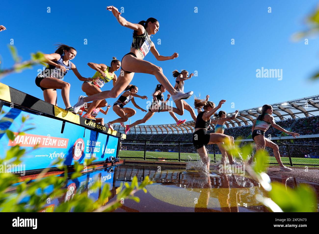 Runners compete in the women's 3000-meter steeplechase at the U.S ...