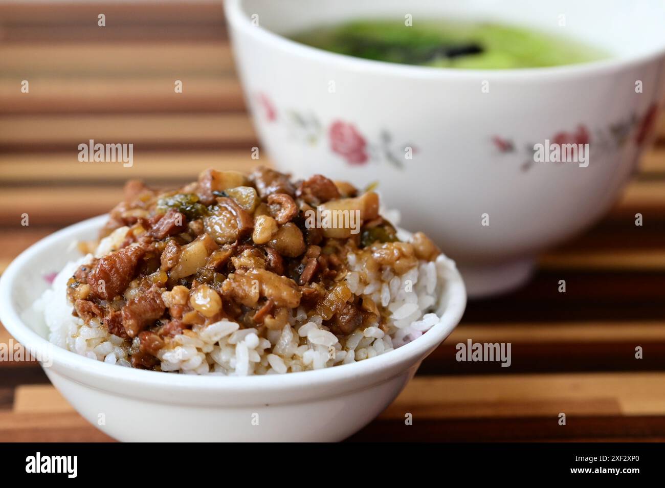 Taiwanese braised pork rice features savory minced pork over fluffy ...