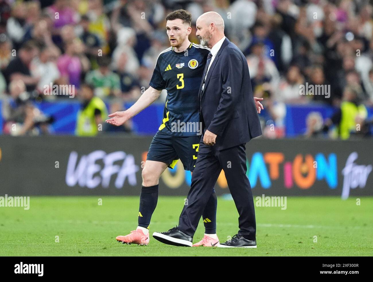 Scotland's Andrew Robertson with manager Steve Clarke following the ...