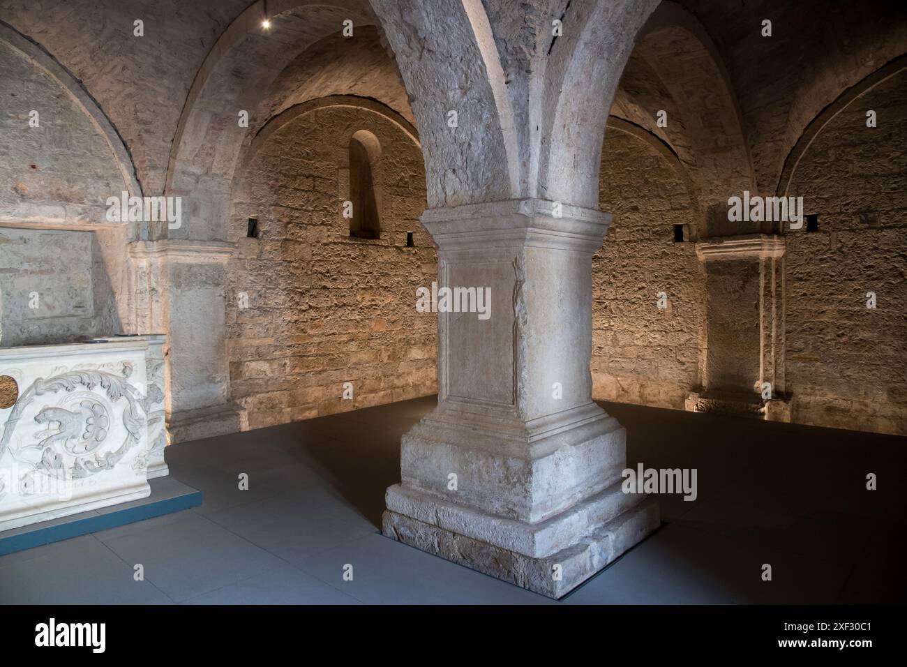 Marble Roman altar used as support of vaults of the lower hall of ...