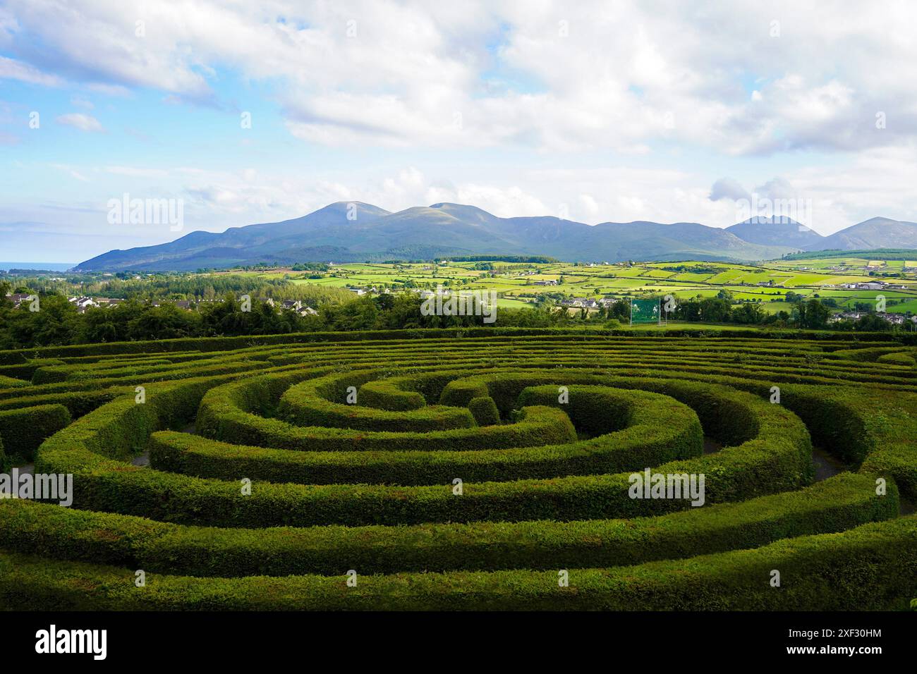 The Peace Maze in Castlewellan, Northern Ireland with The Mourne ...