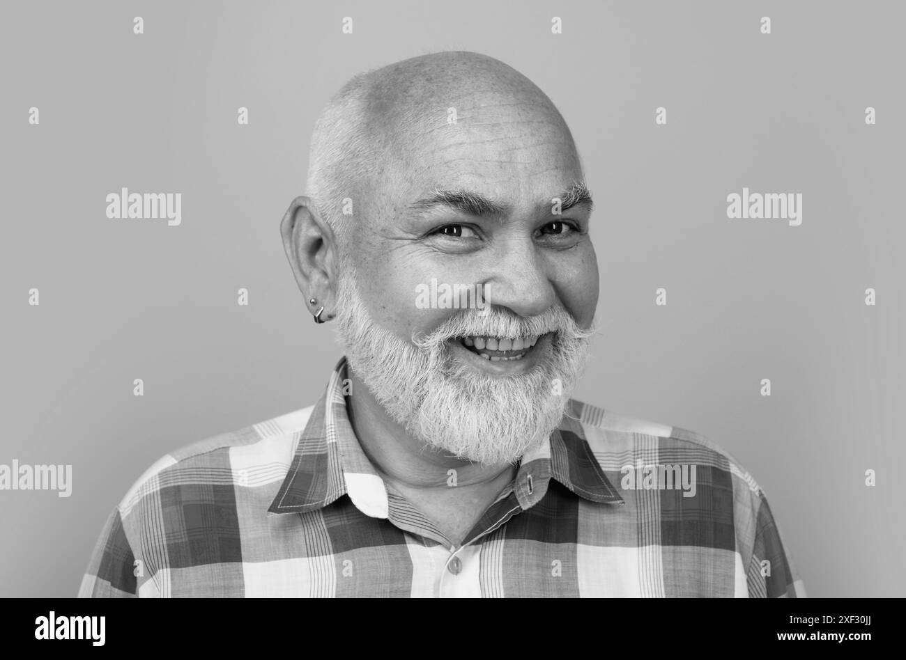 Happy old mature man smiling. Portrait of an bald old mature senior man ...