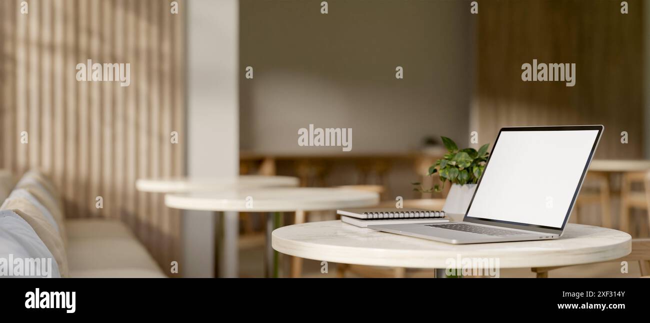 A close-up side view image of a laptop computer with a white-screen ...