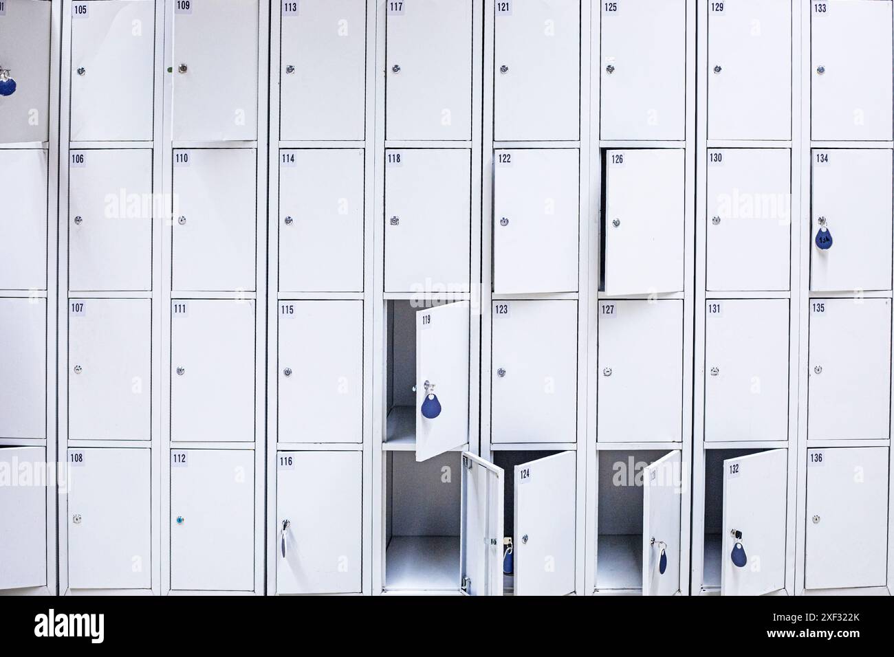 open and closed cabinets with a lock for storing things in front of the ...