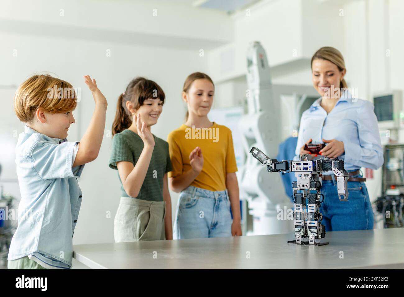 Children learning robotics in Elementary school. Young students ...