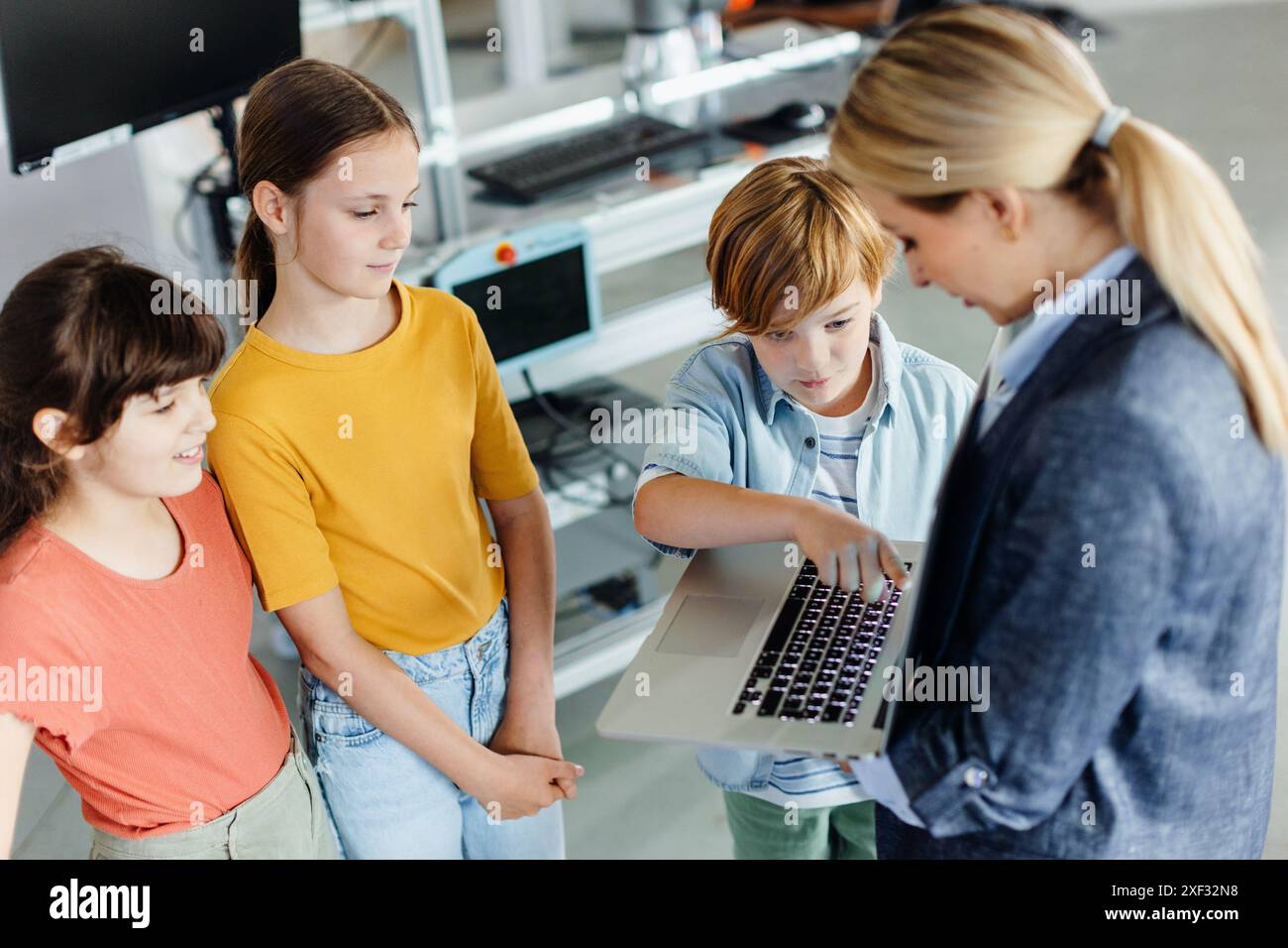 Children learning robotics in Elementary school. Young students ...
