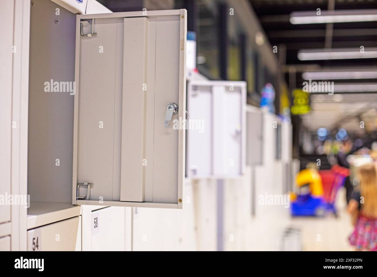 open and closed cabinets with a lock for storing things in front of the ...
