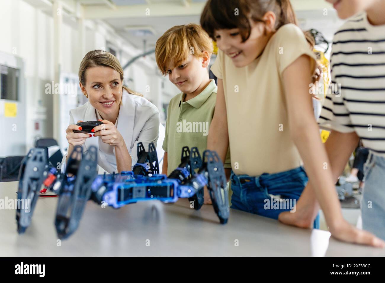 Children learning robotics in Elementary school. Young students ...